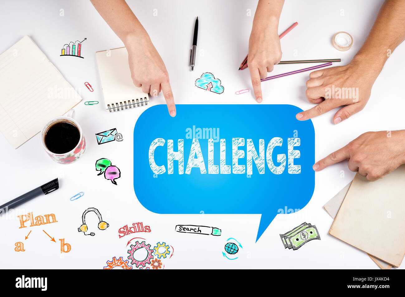 Challenge. The meeting at the white office table Stock Photo - Alamy