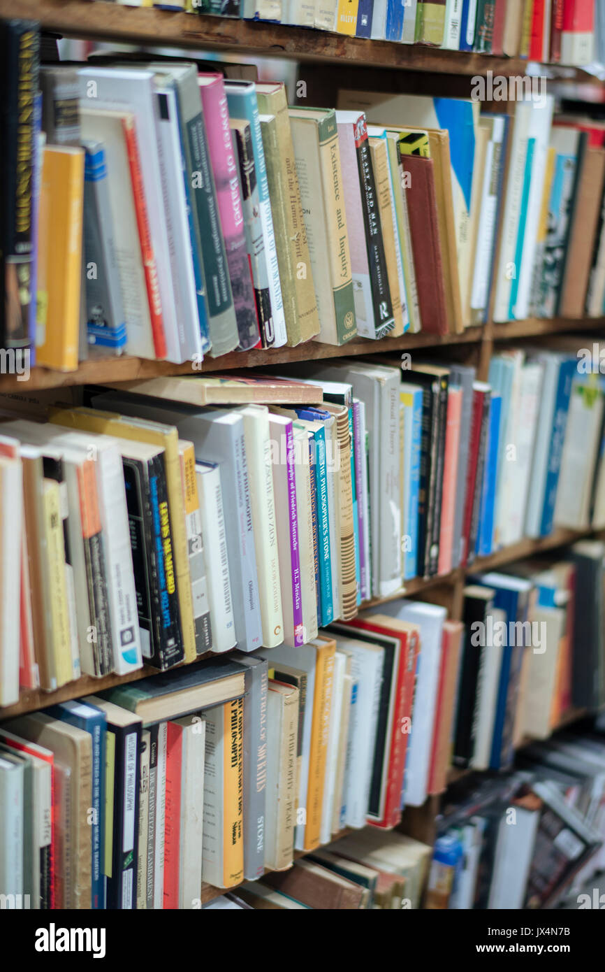 Used books stacked on shelves, in a small book store Stock Photo - Alamy