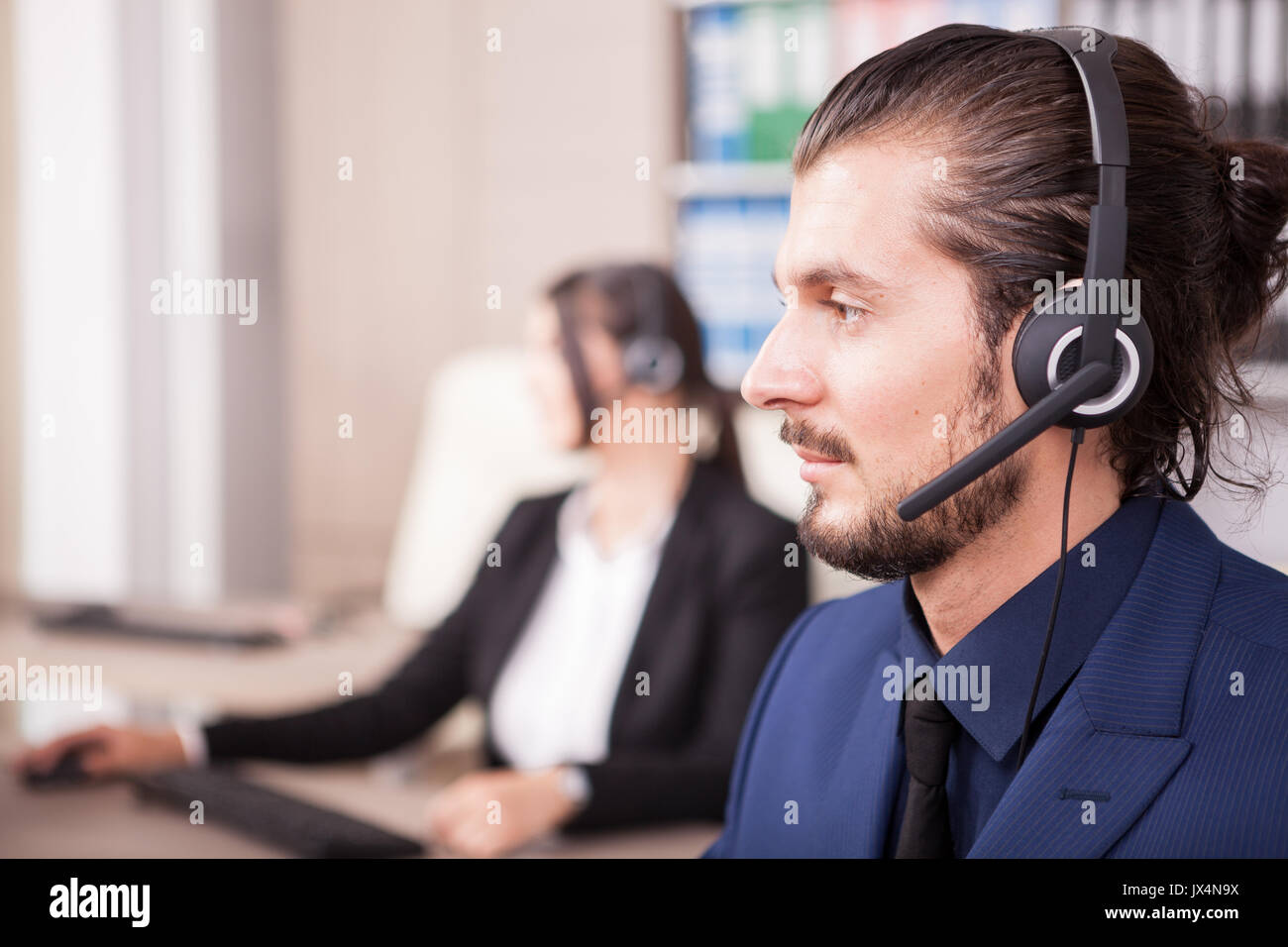 Portrait of man from customer support line in the office Stock Photo ...