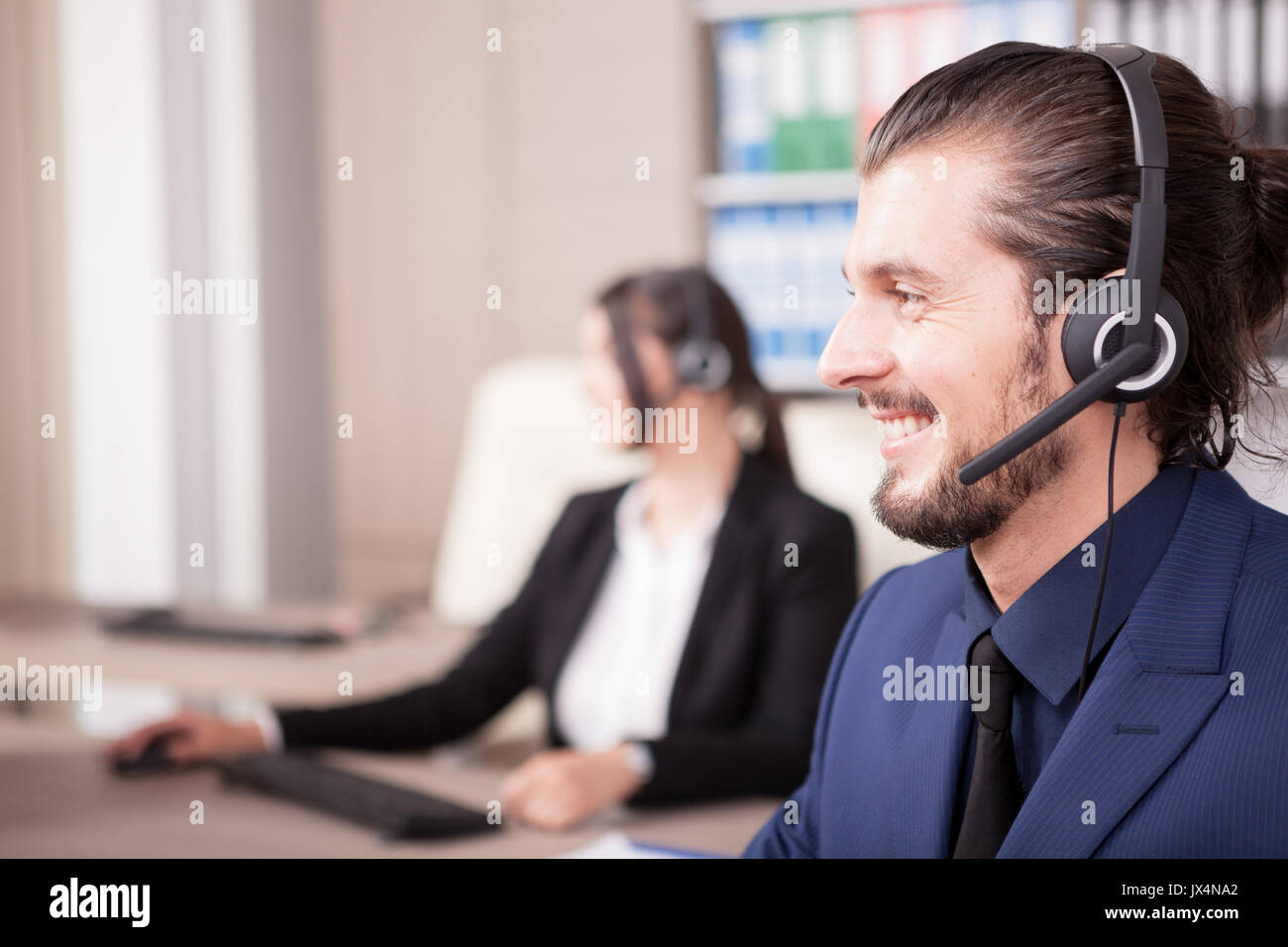 Portrait of man from customer support line in the office Stock Photo ...