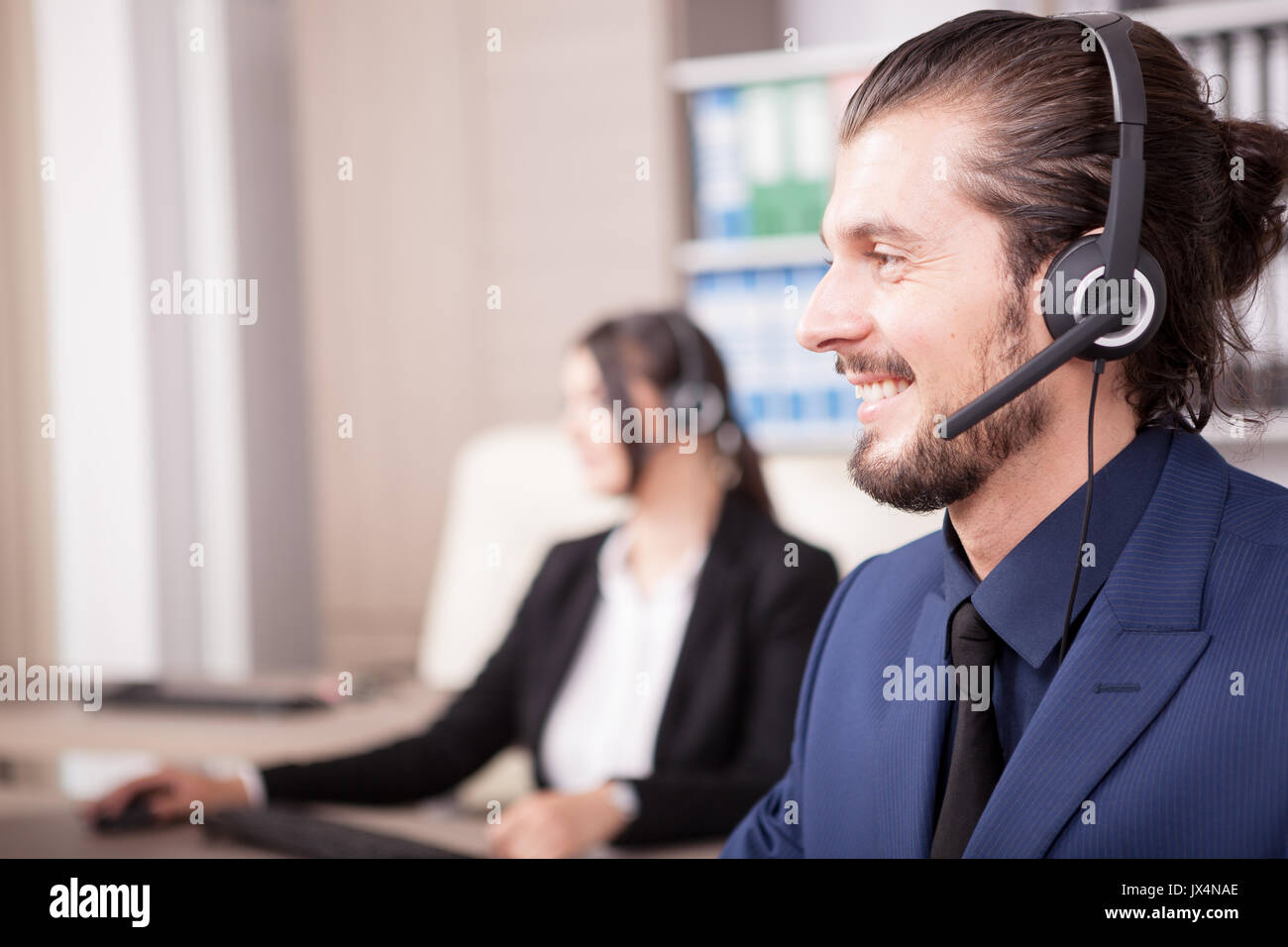 Portrait of man from customer support line in the office Stock Photo ...