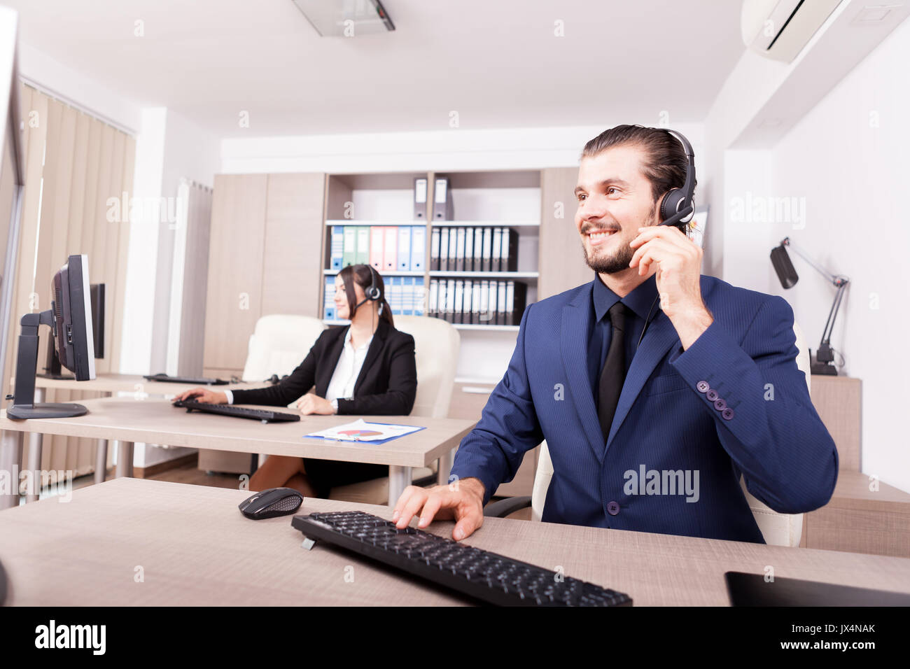 Portrait of man from customer support line in the office Stock Photo ...