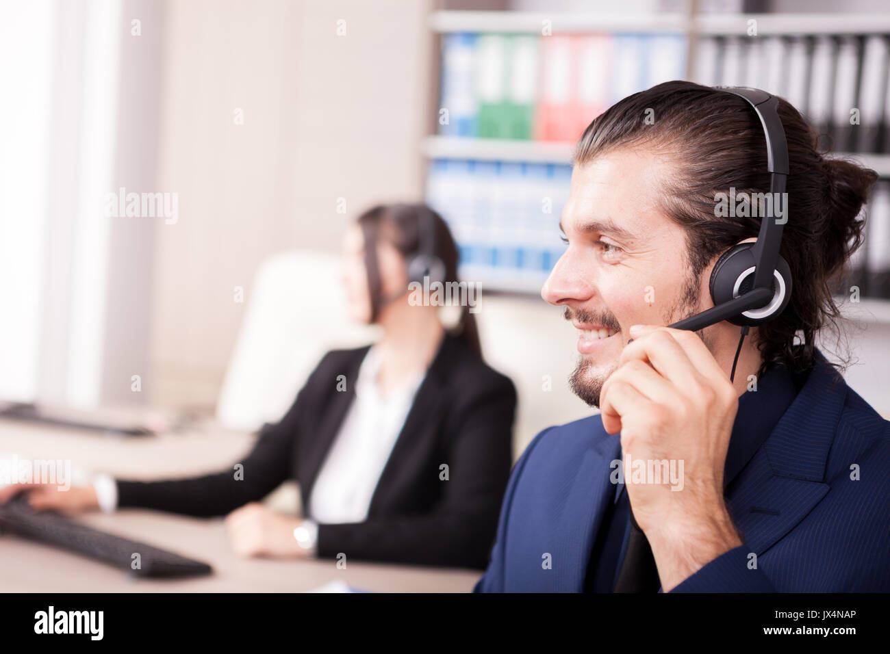 Portrait of man from customer support line in the office Stock Photo ...
