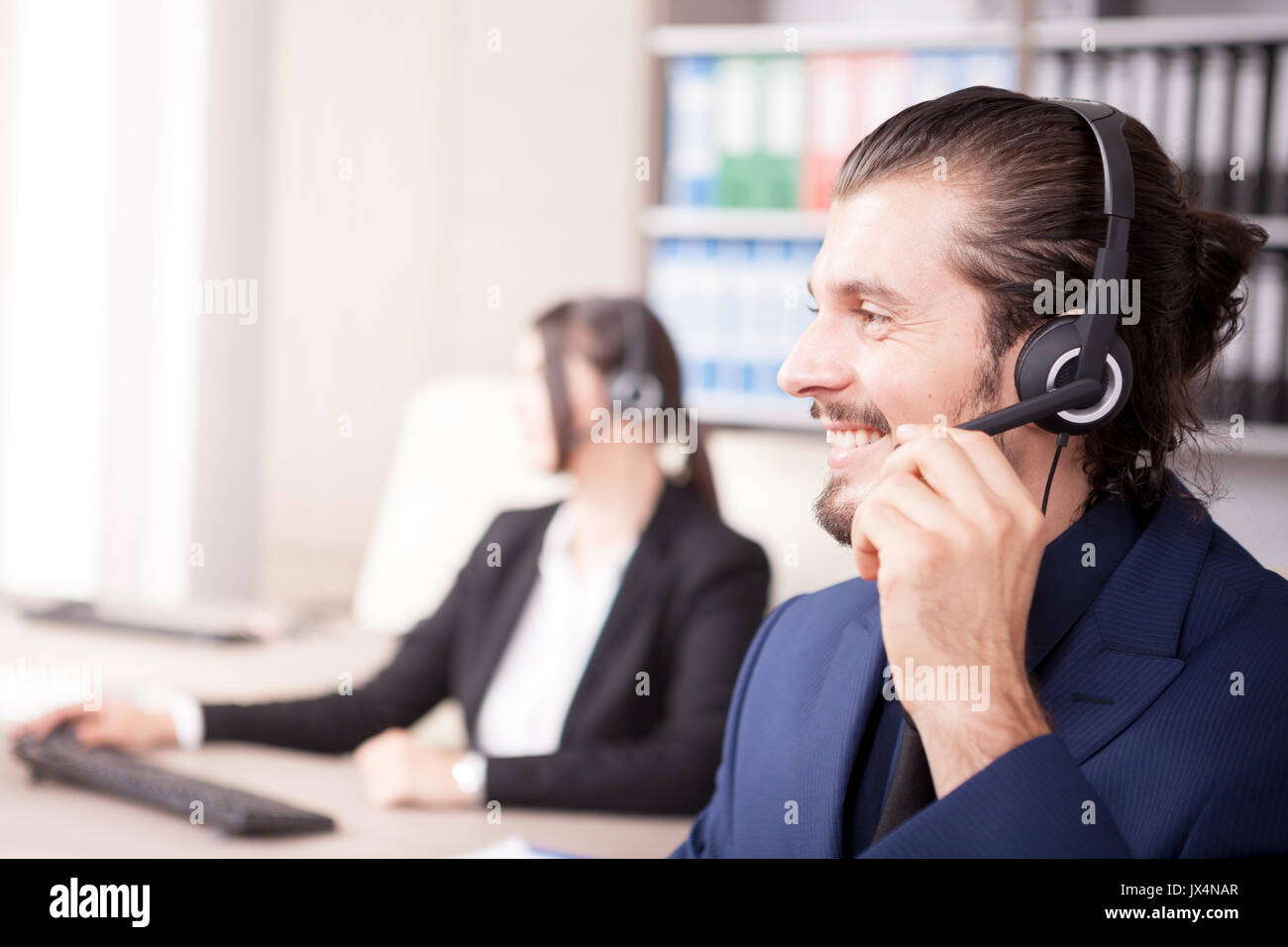 Portrait of man from customer support line in the office Stock Photo ...
