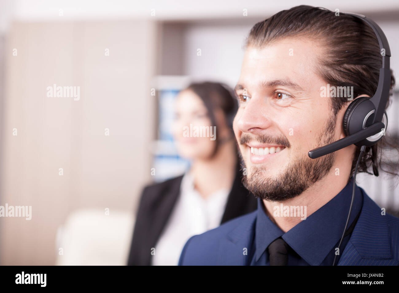Office of customer support line with people working in it Stock Photo ...