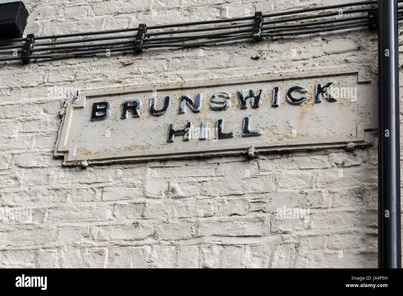 Brunswick Hill Street Sign Afixed to White Painted Brickwall Stock ...