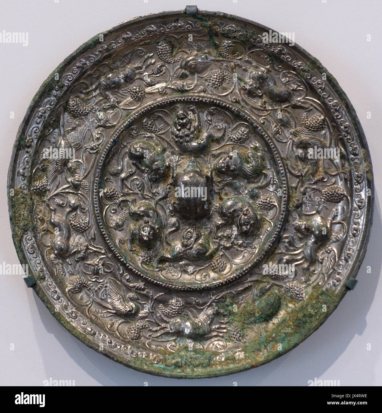 Mirror with Lions, Birds, and Fruiting Grapevine Arabesque, China, Tang ...