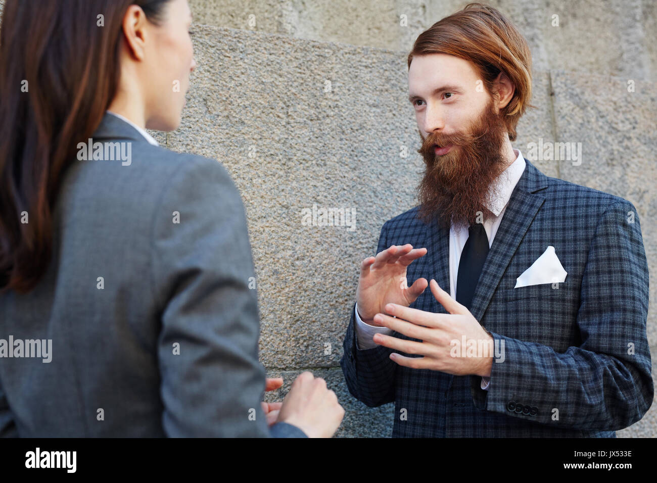 Explaining conversation hi-res stock photography and images - Alamy