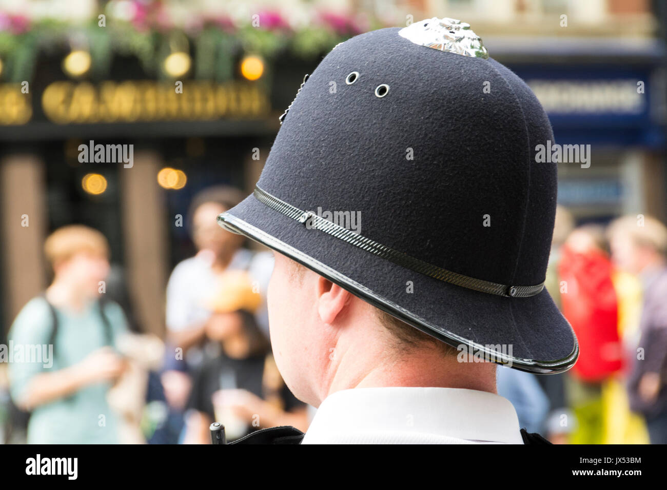 A Metropolitan Policeman (Bobby) on the 'beat' on the streets of London ...