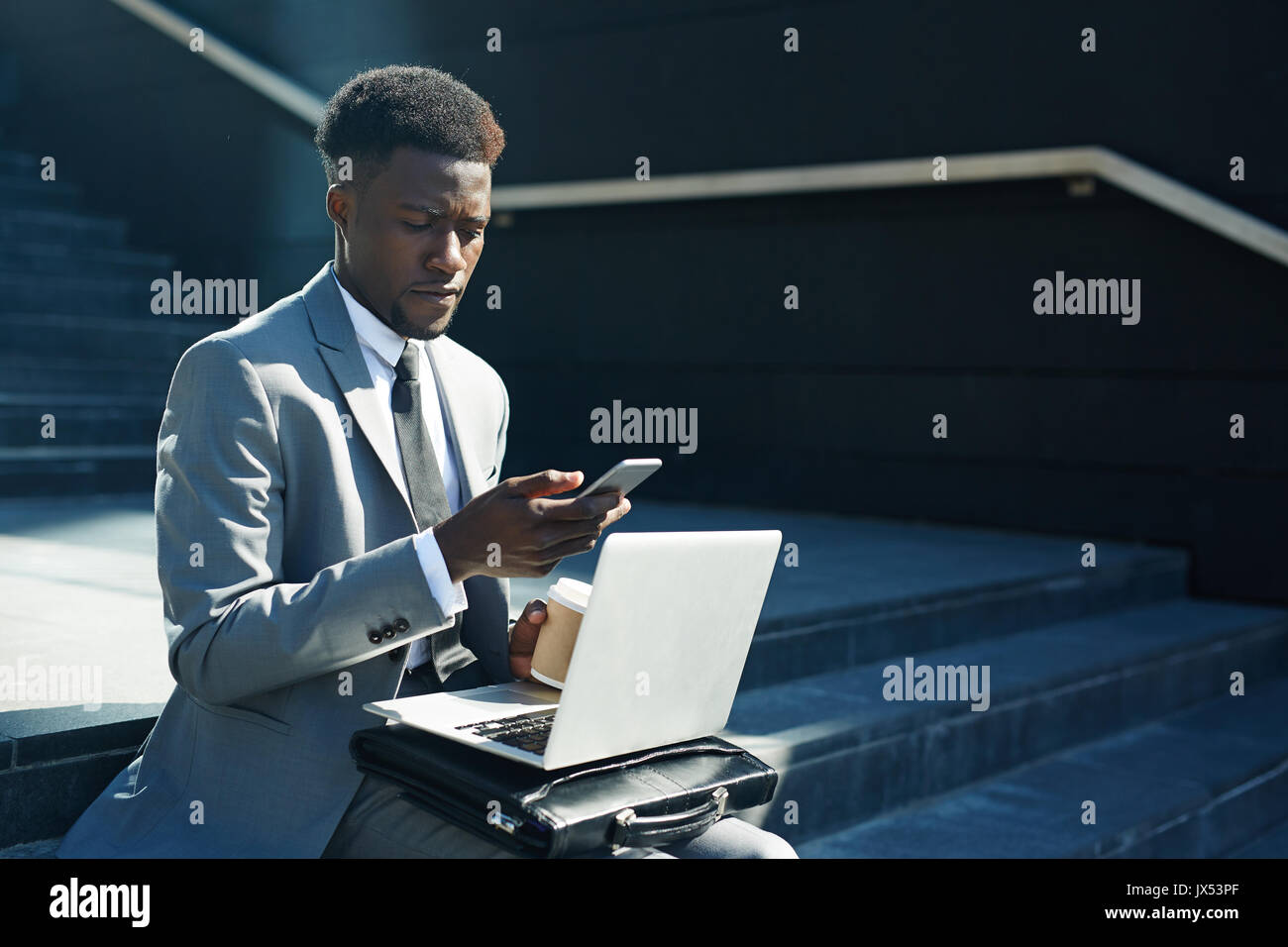 Communicating by gadgets Stock Photo - Alamy