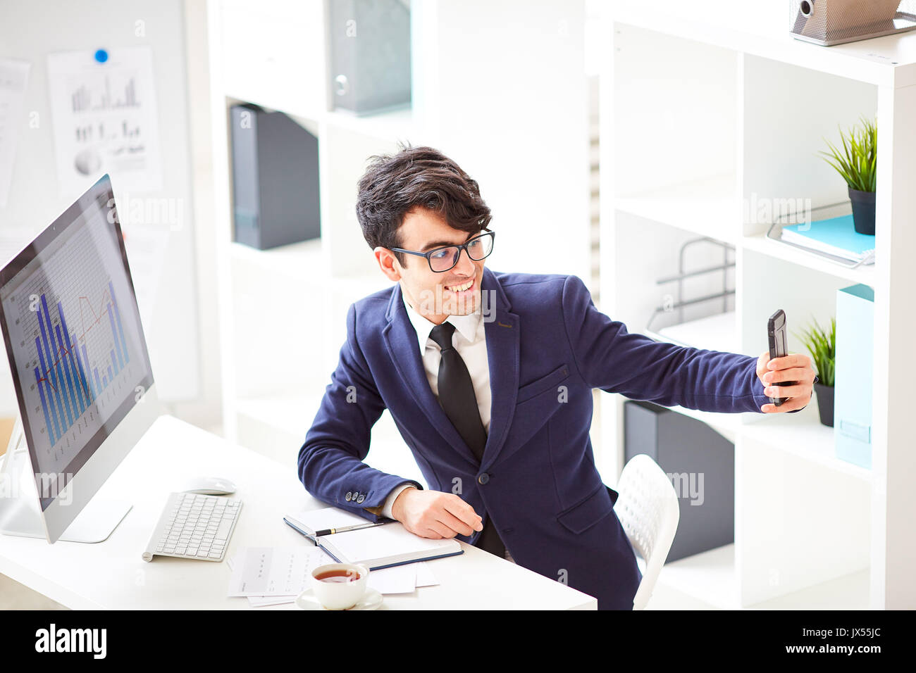 Selfie at workplace Stock Photo - Alamy
