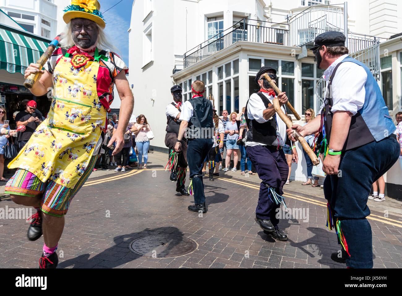 Traditional Morris dancers, Dead Horse Morris dancing in small square ...