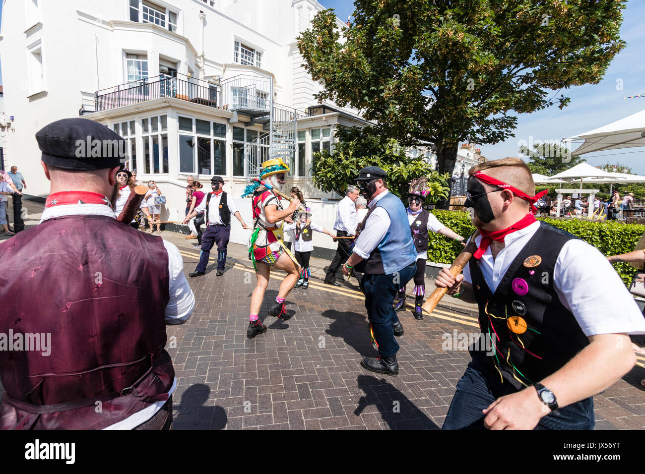 Traditional Morris dancers, Dead Horse Morris dancing in small square ...