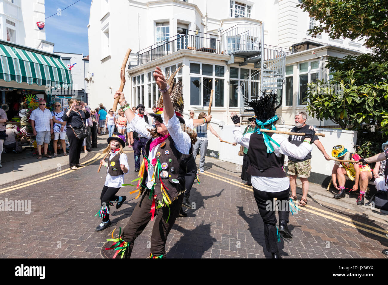 Traditional folk dancers, Dead Horse Morris, dancing in small public ...