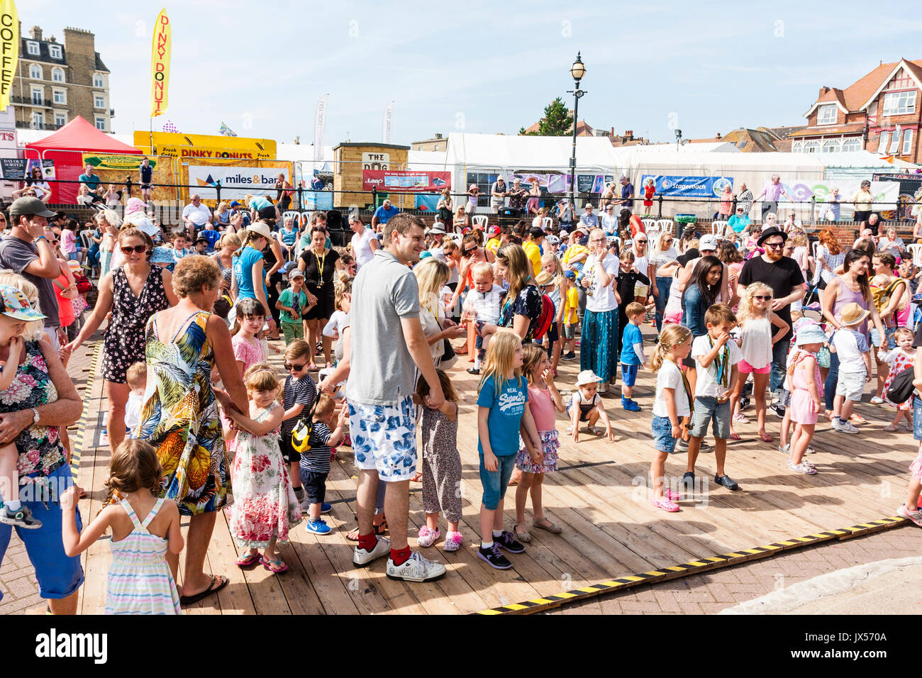 Children and parents in crowd hi-res stock photography and images - Alamy