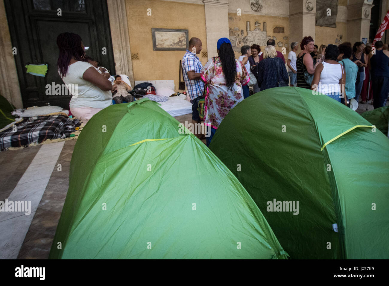 Rome, Italy. 14th August, 2017. Migrant families with children during a ...