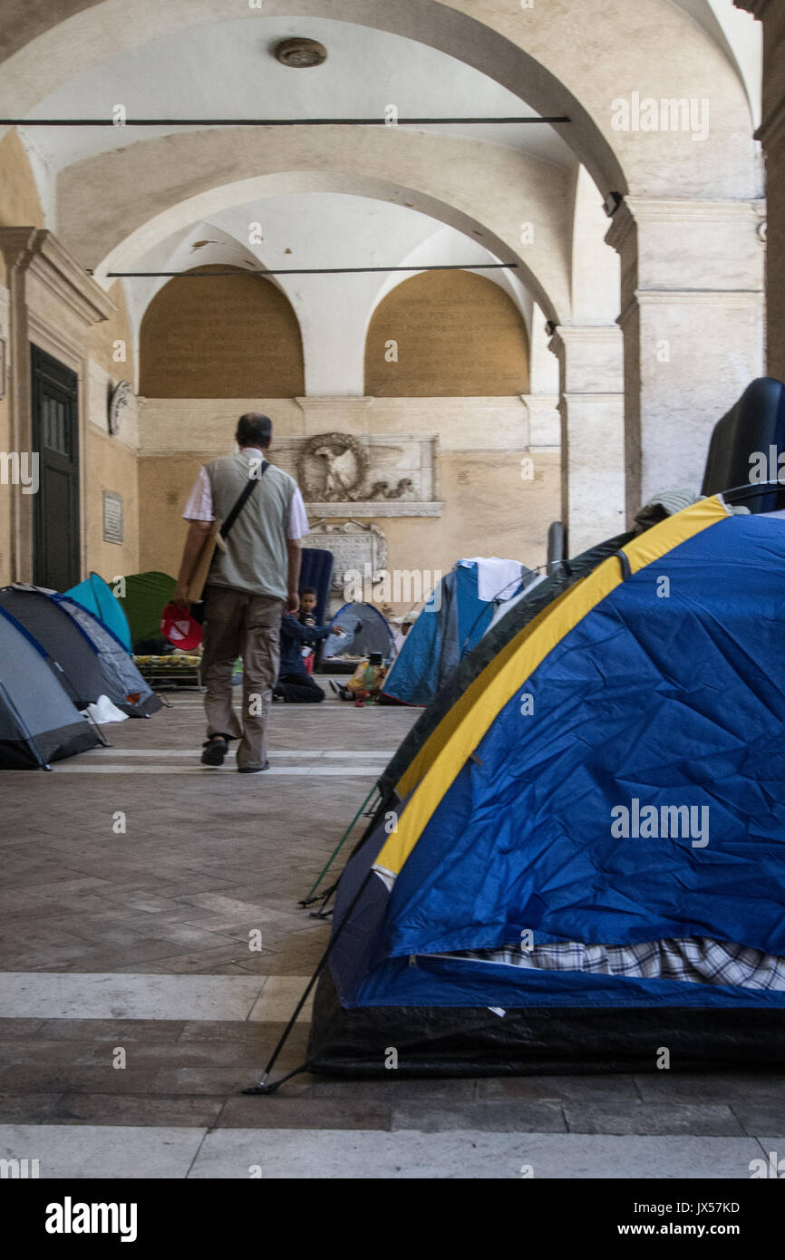 Rome, Italy. 14th August, 2017. Migrant families with children during a ...