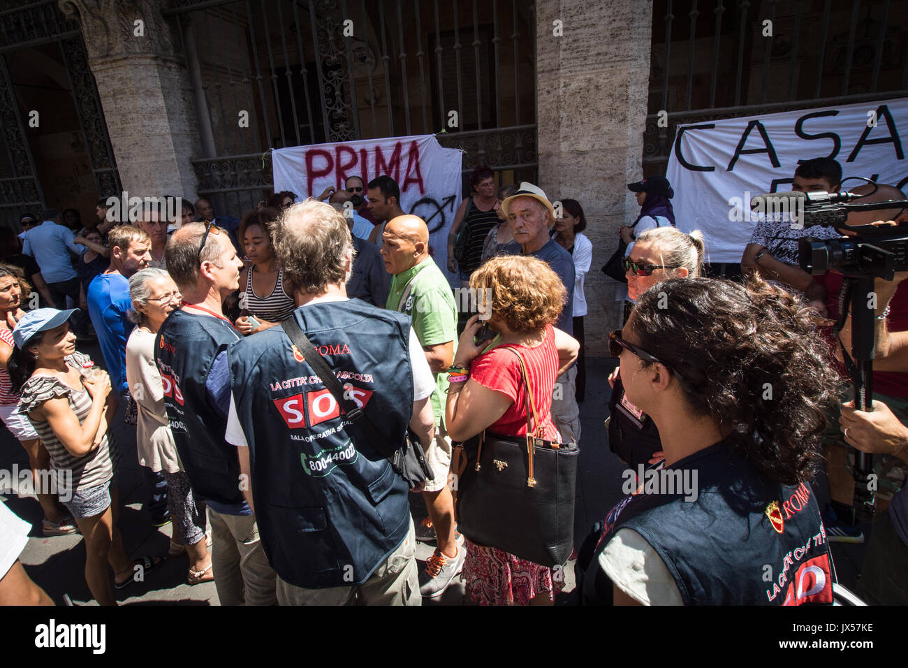 Rome, Italy. 14th August, 2017. Migrant families with children during a ...