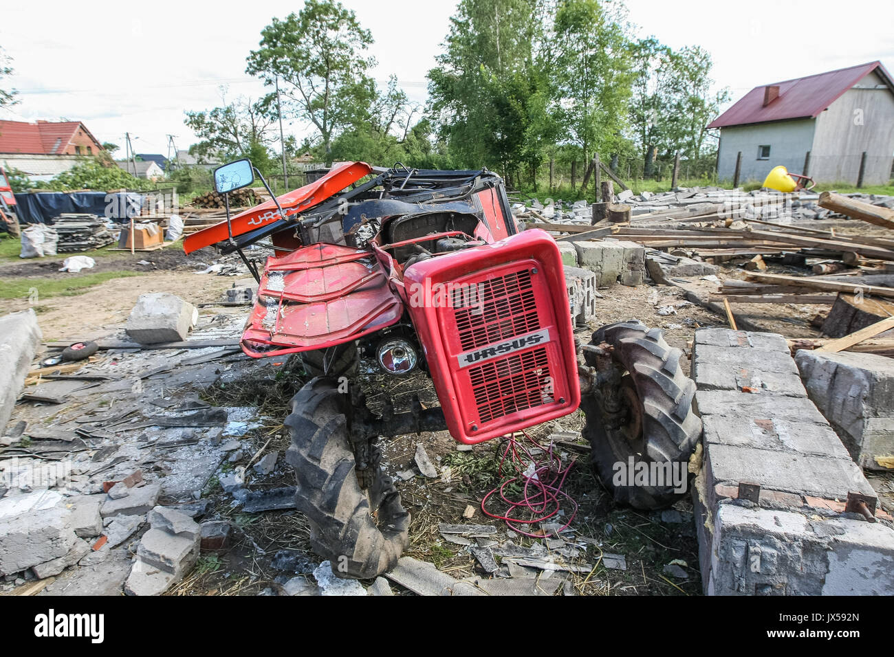 Sylczno, Poland. 14th Aug, 2017. Destroyed building and smashed tractor ...