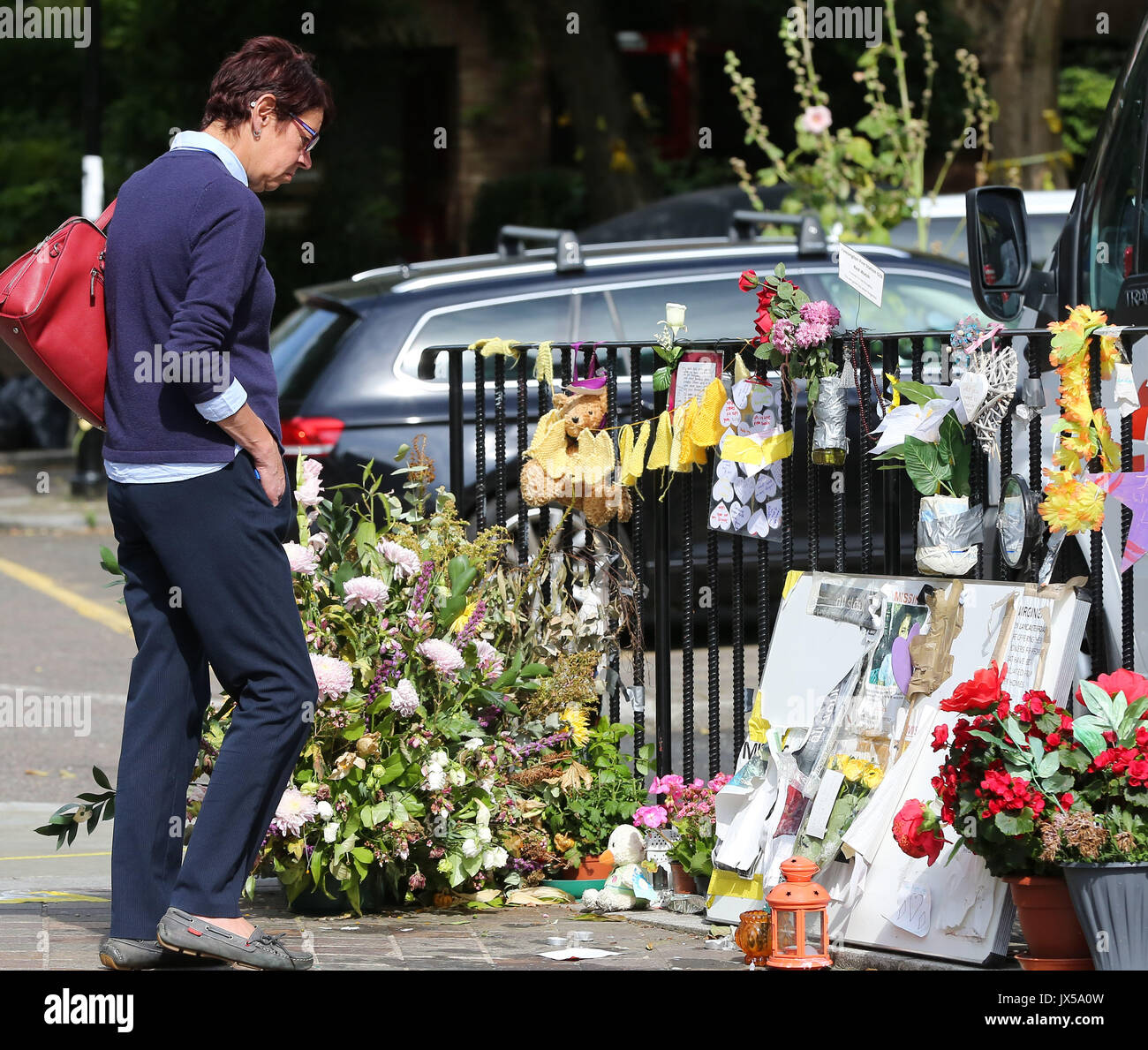 Grenfell Tower. West London. 14 Aug 2017 - People views the floral ...