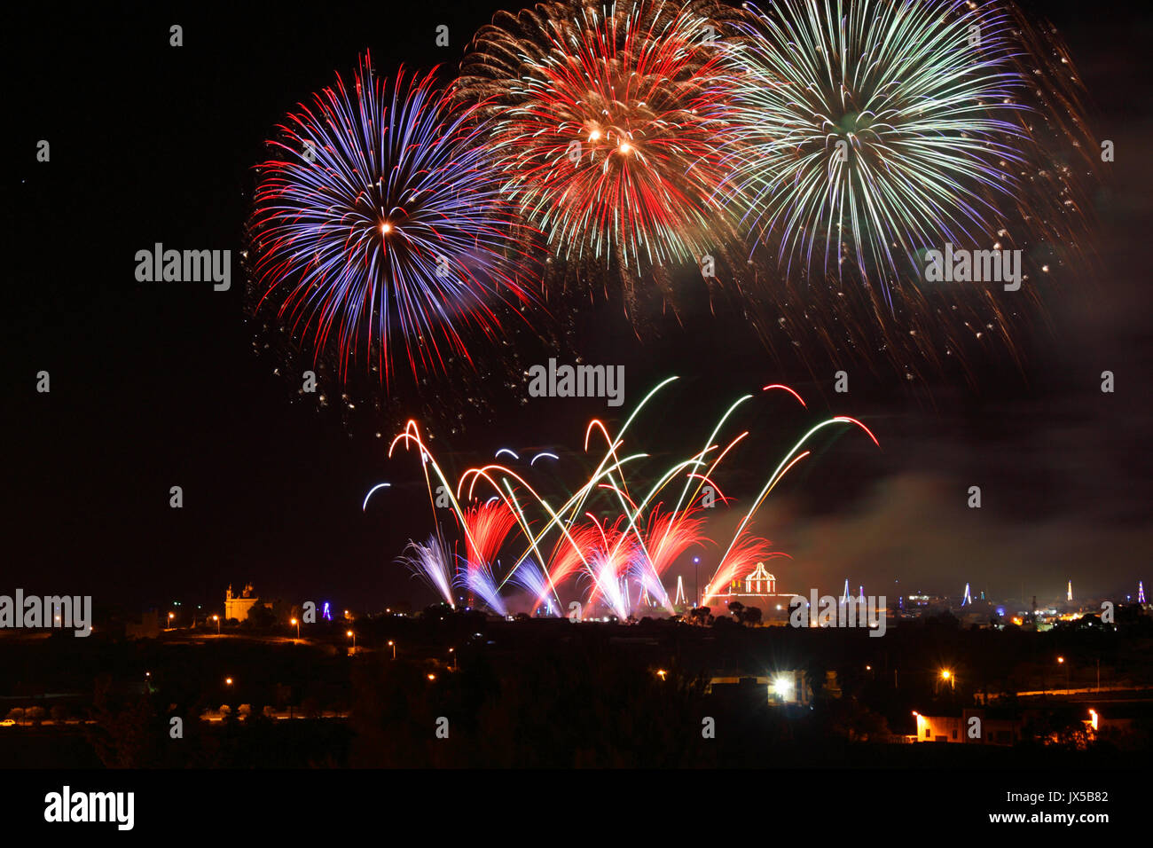 Fireworks are let off above the church of Ghaxaq village in Malta on ...