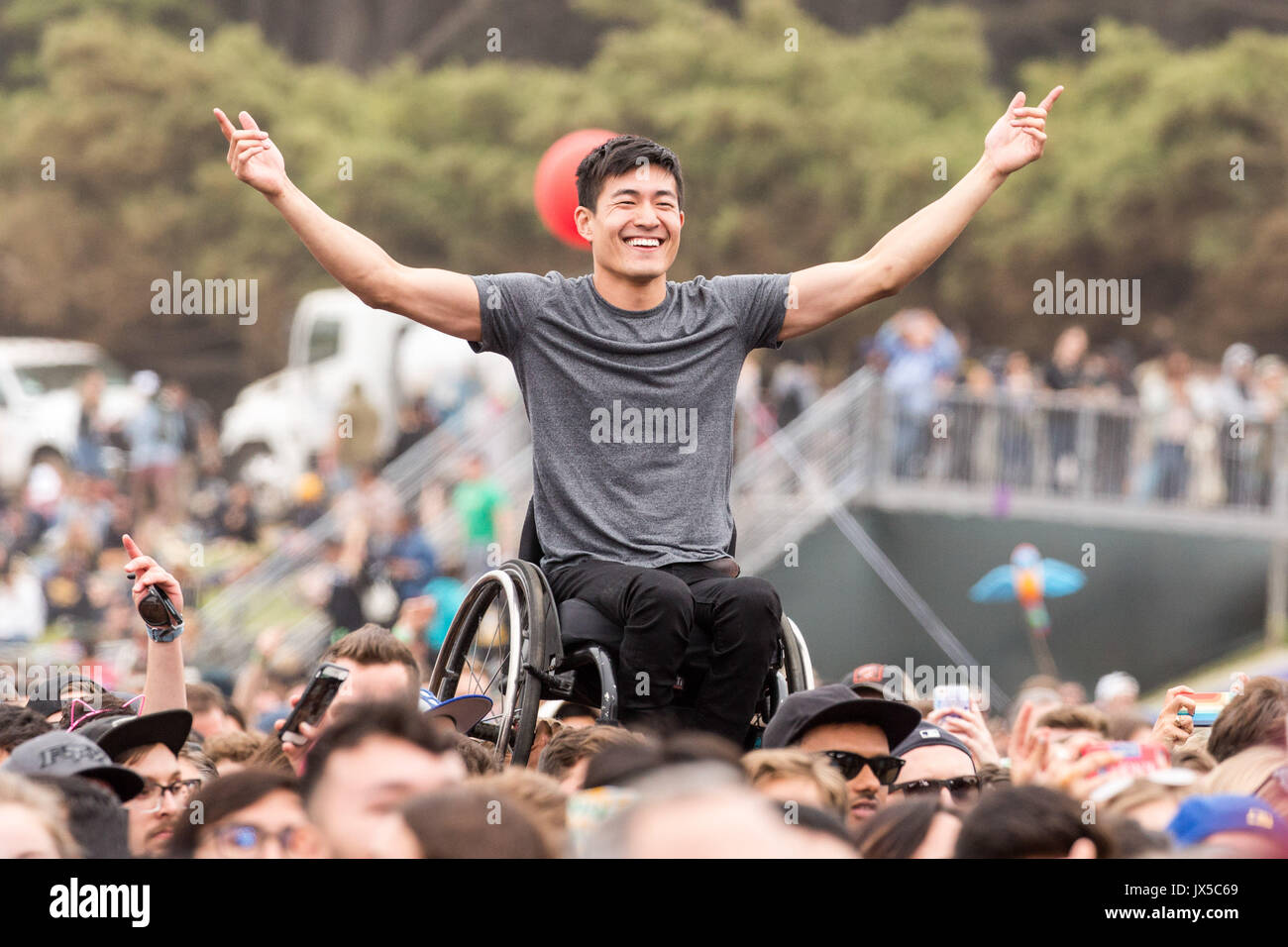 San Francisco, California, USA. 13th Aug, 2017. Music fan RYAN CHEN is ...
