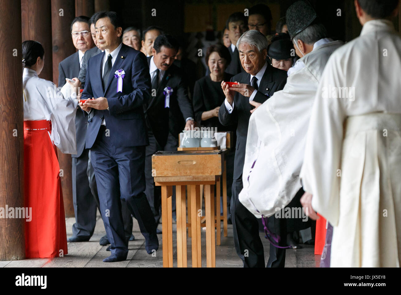 Tokyo, Japan. 15th Aug, 2017. A group of lawmakers, including Hidehisa ...