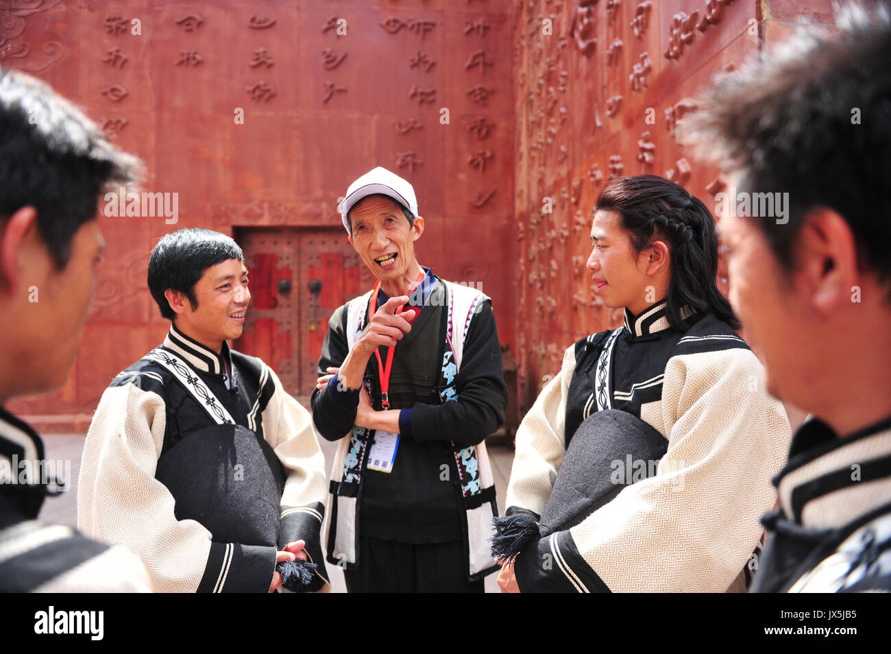 Shuicheng, China's Guizhou Province. 15th Aug, 2017. An old man tells ...