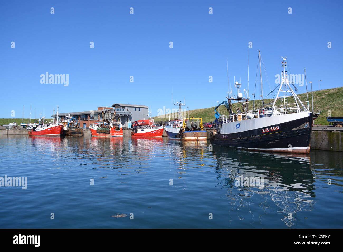 Boats at Eyemouth Harbour Stock Photo - Alamy