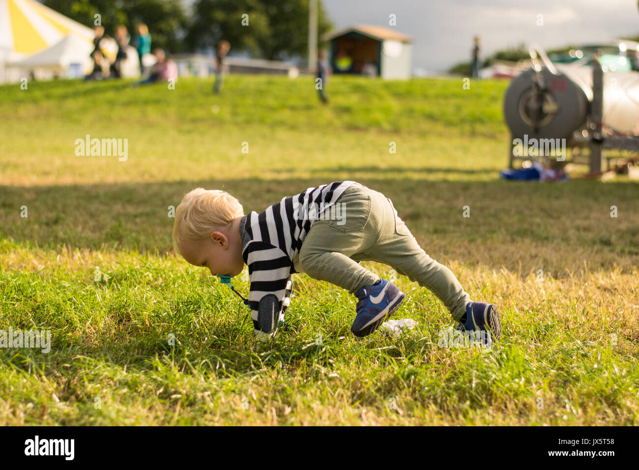 Learning how to walk Stock Photo - Alamy