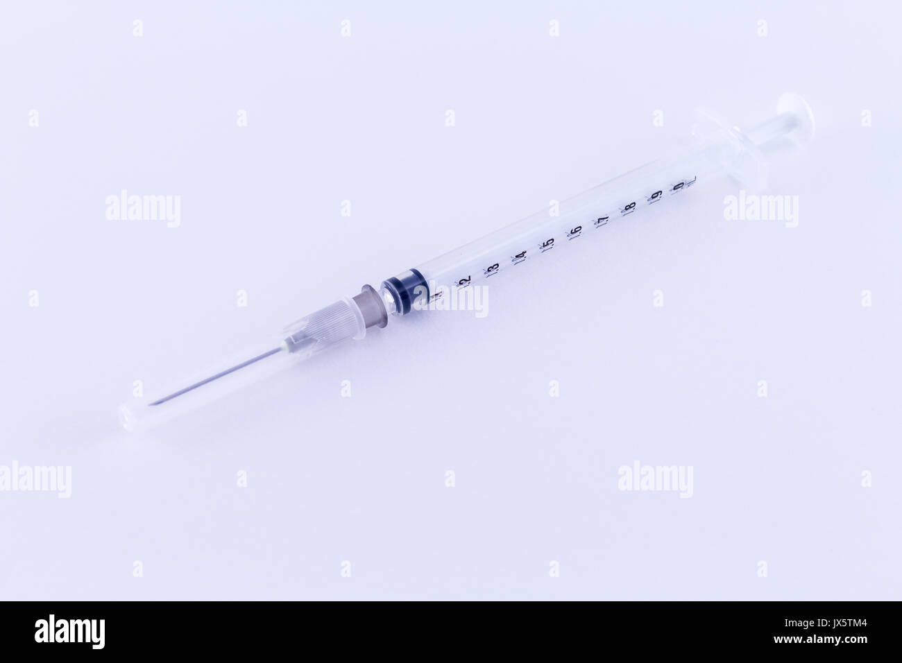 Syringe isolated on white background Stock Photo - Alamy