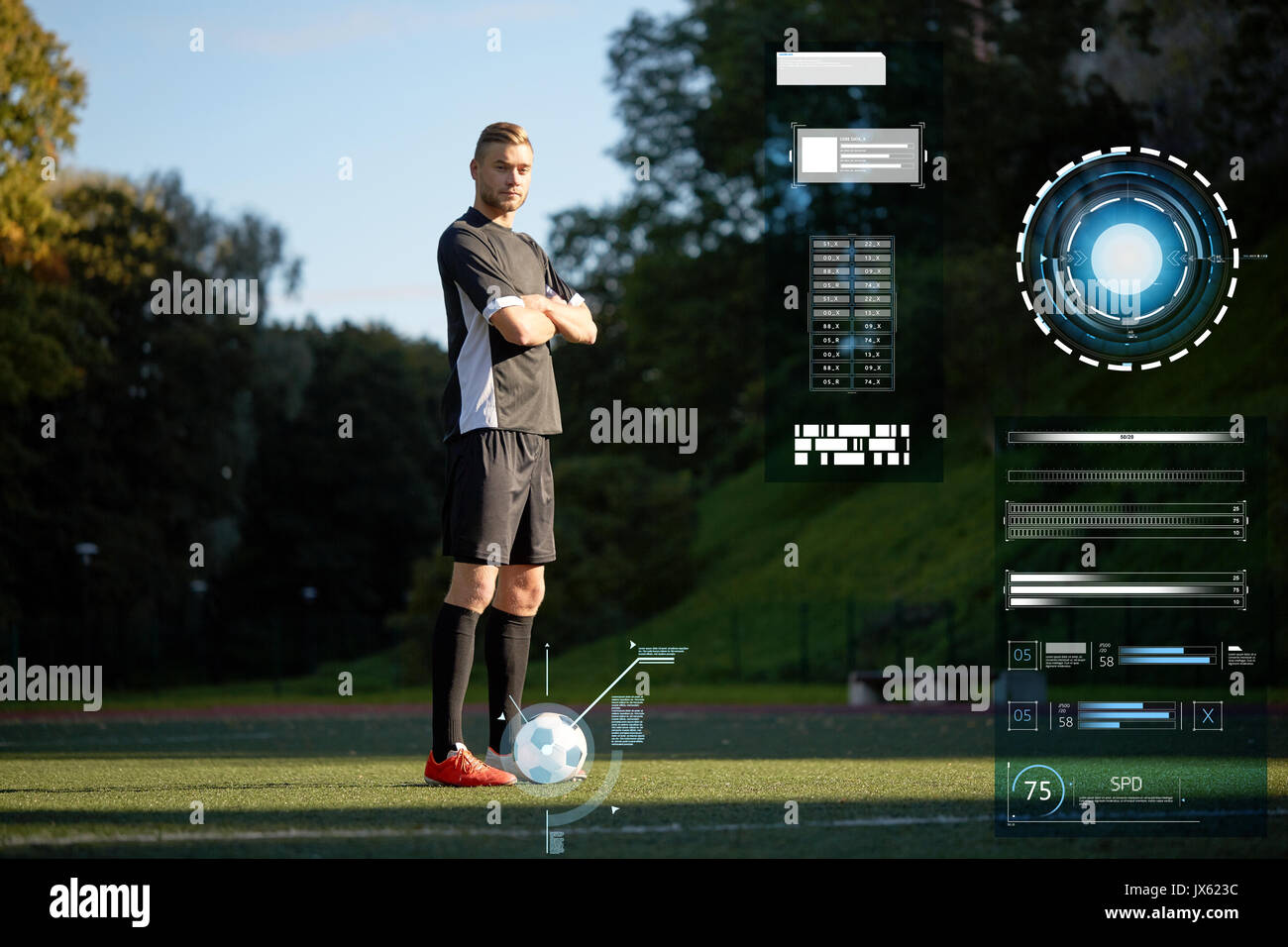 soccer player with ball on football field Stock Photo - Alamy