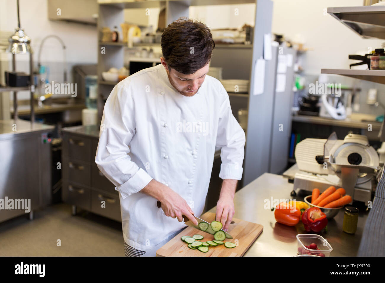 happy male chef cooking food at restaurant kitchen Stock Photo - Alamy