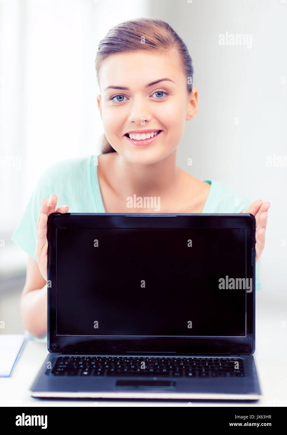 smiling student girl with laptop Stock Photo - Alamy