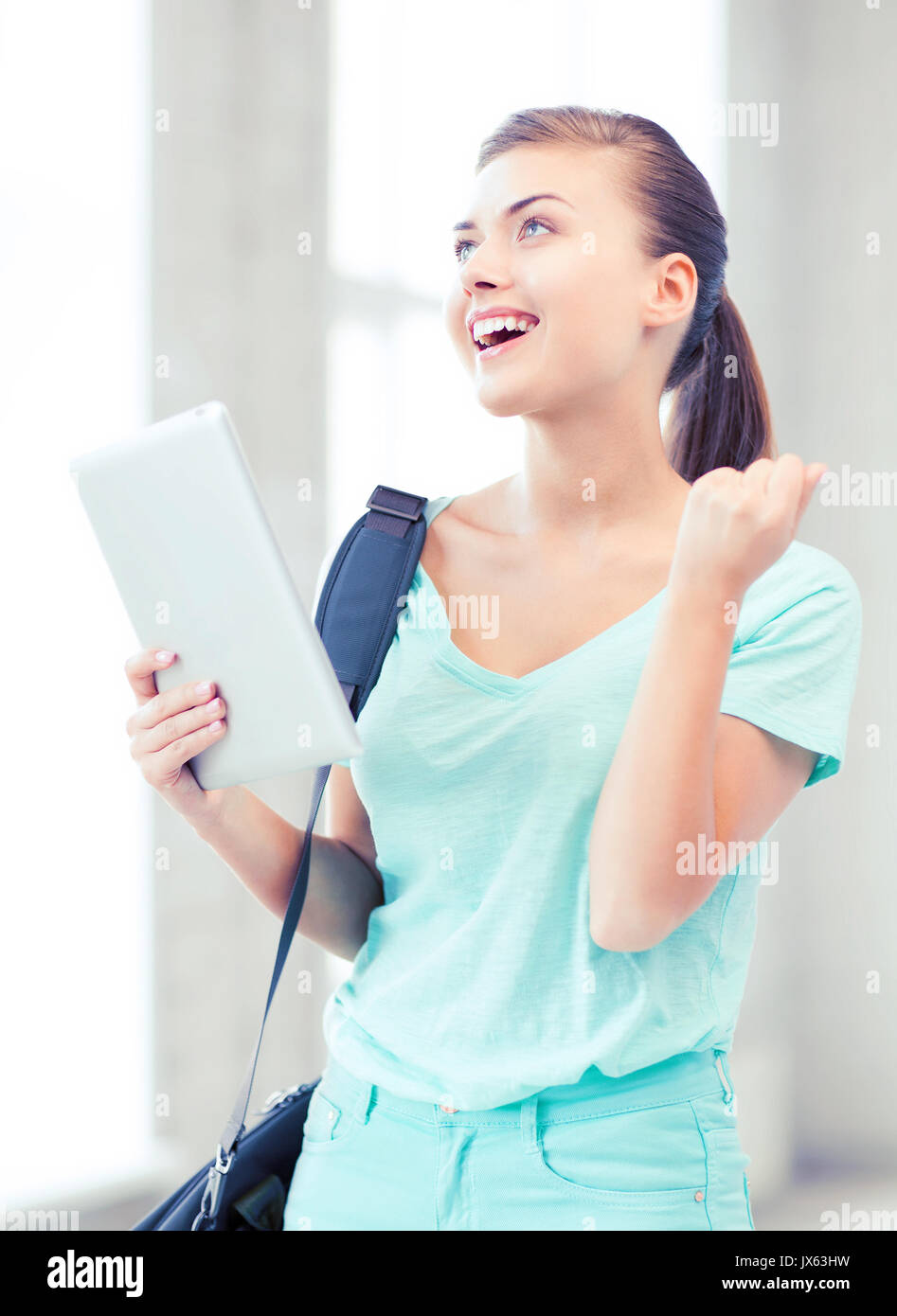 happy student girl with tablet pc Stock Photo - Alamy