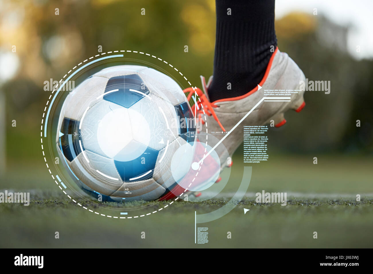soccer player playing with ball on football field Stock Photo - Alamy