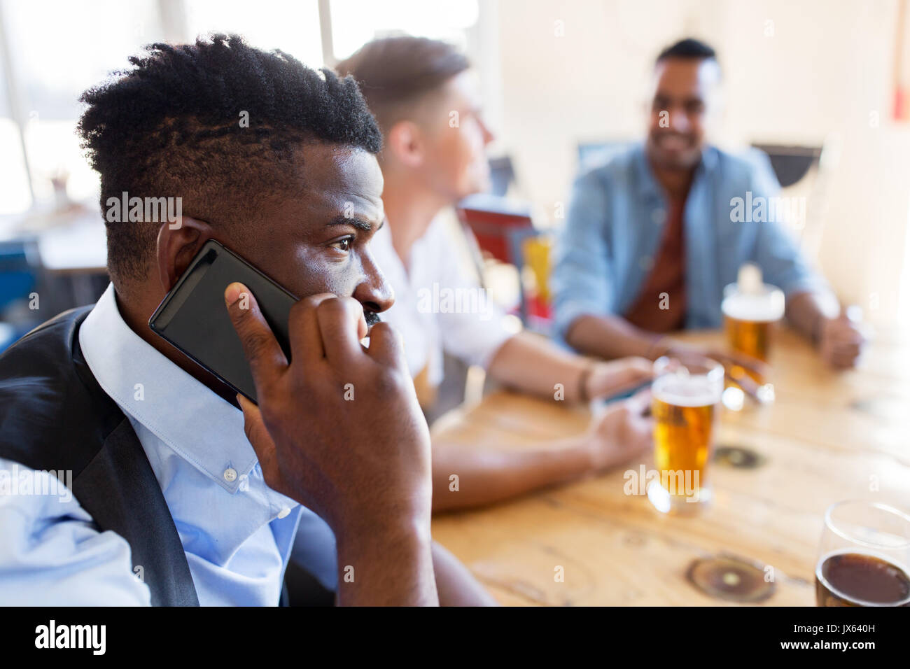 Man friends drinking smiling not woman hi-res stock photography and ...