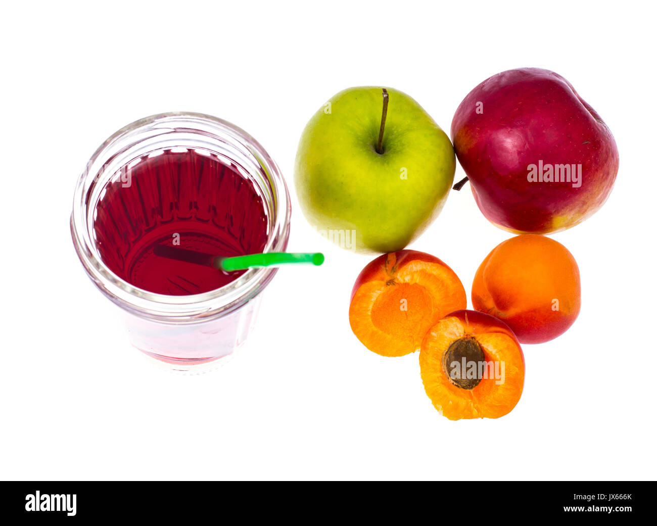 Juice in glass beaker and fresh fruit. Studio Photo Stock Photo - Alamy