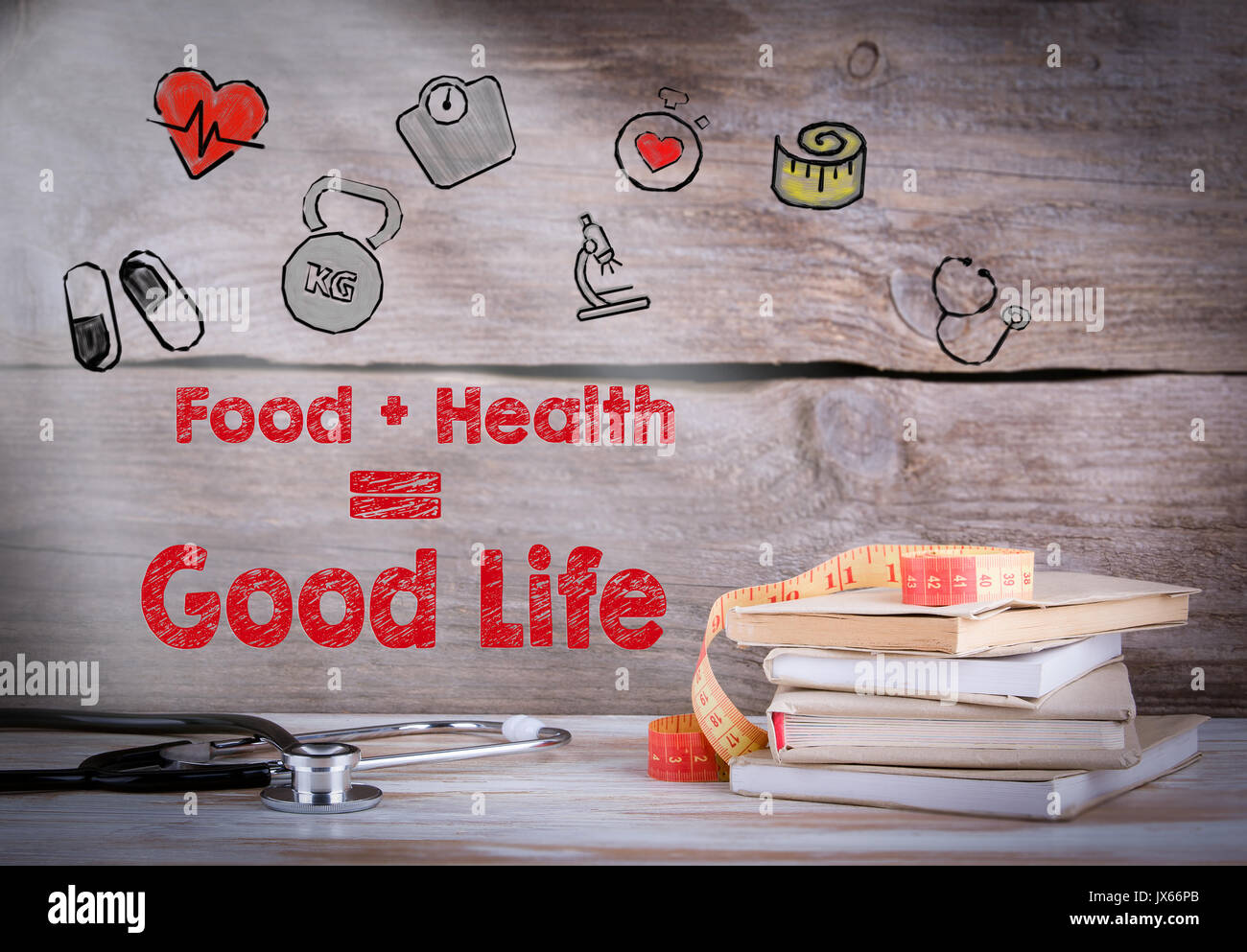 Healthy Lifestyle Concept. Stack of books and a stethoscope on a wooden ...