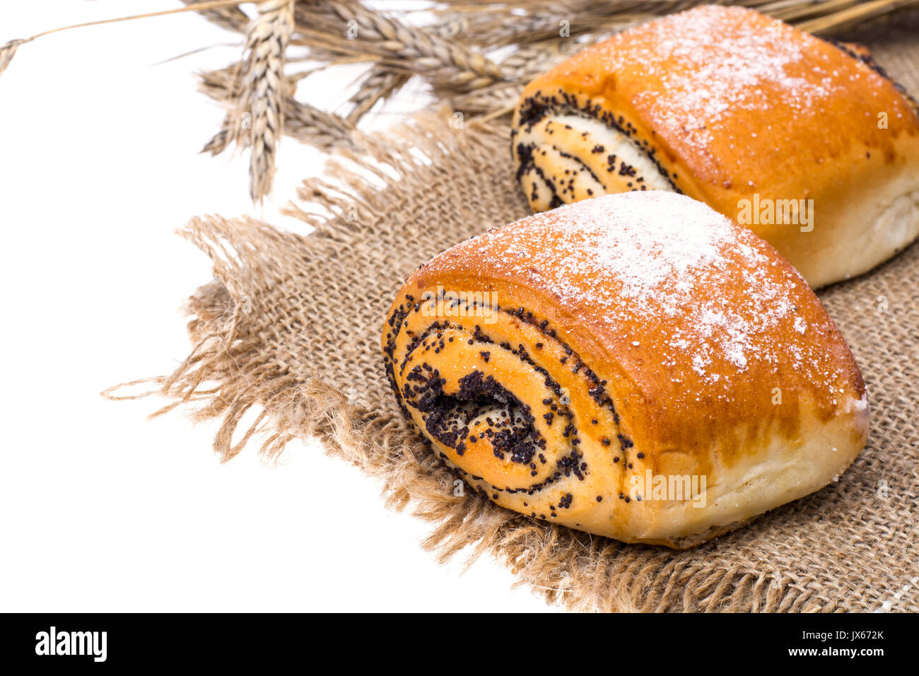 Sweet wheat roll with poppy seeds. Studio Photo Stock Photo - Alamy
