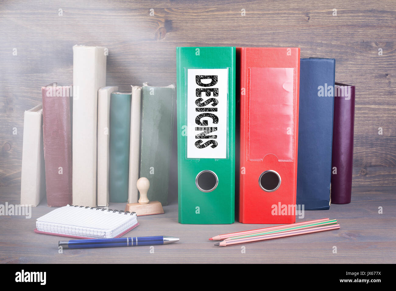 Designs. Binder on desk in the office. Business background Stock Photo ...