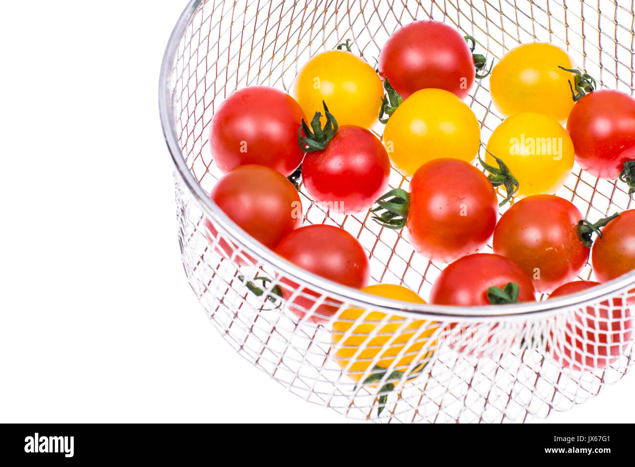 Small colored cherry tomatoes on white background. Studio Photo Stock ...