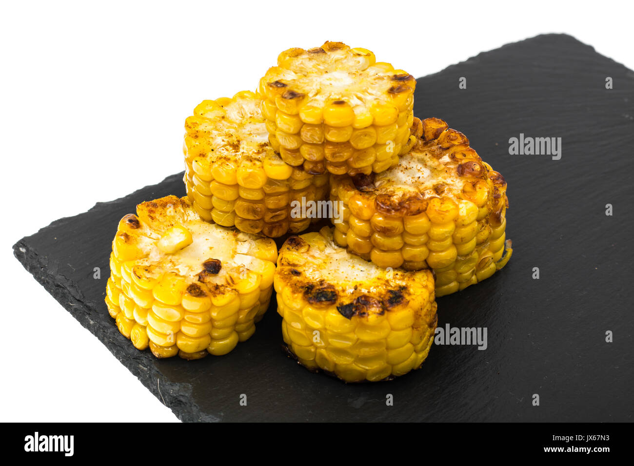 Spicy corn grill on black stone. Studio Photo Stock Photo - Alamy