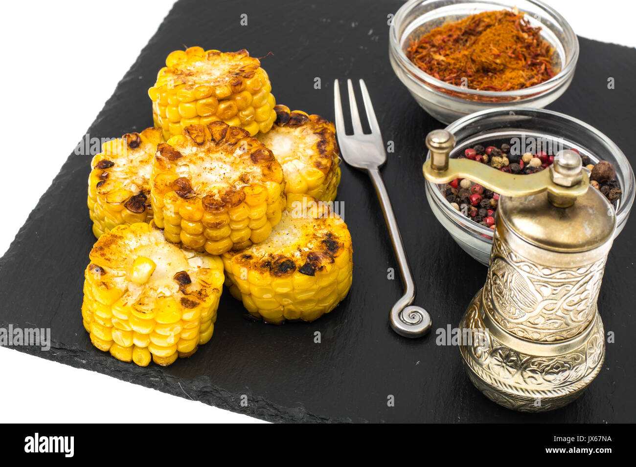 Spicy corn grill on black stone. Studio Photo Stock Photo - Alamy