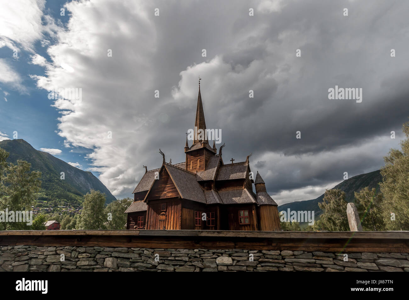 Church in Lom with a dark sky. Lom is de Norwagian town Stock Photo - Alamy