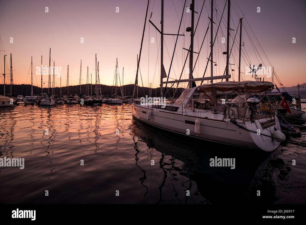 Yacht in bay with evening light. Sunset with pleasant colors Stock ...