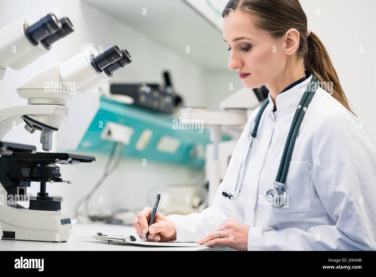 Doctor assistant lab coat hi-res stock photography and images - Alamy