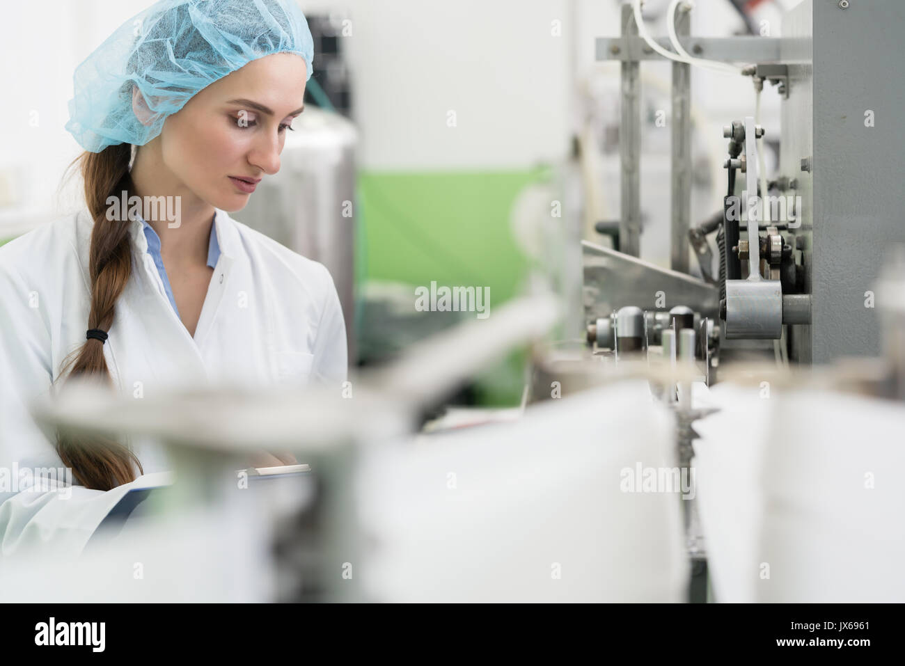 Worker employee white lab coat hi-res stock photography and images - Alamy