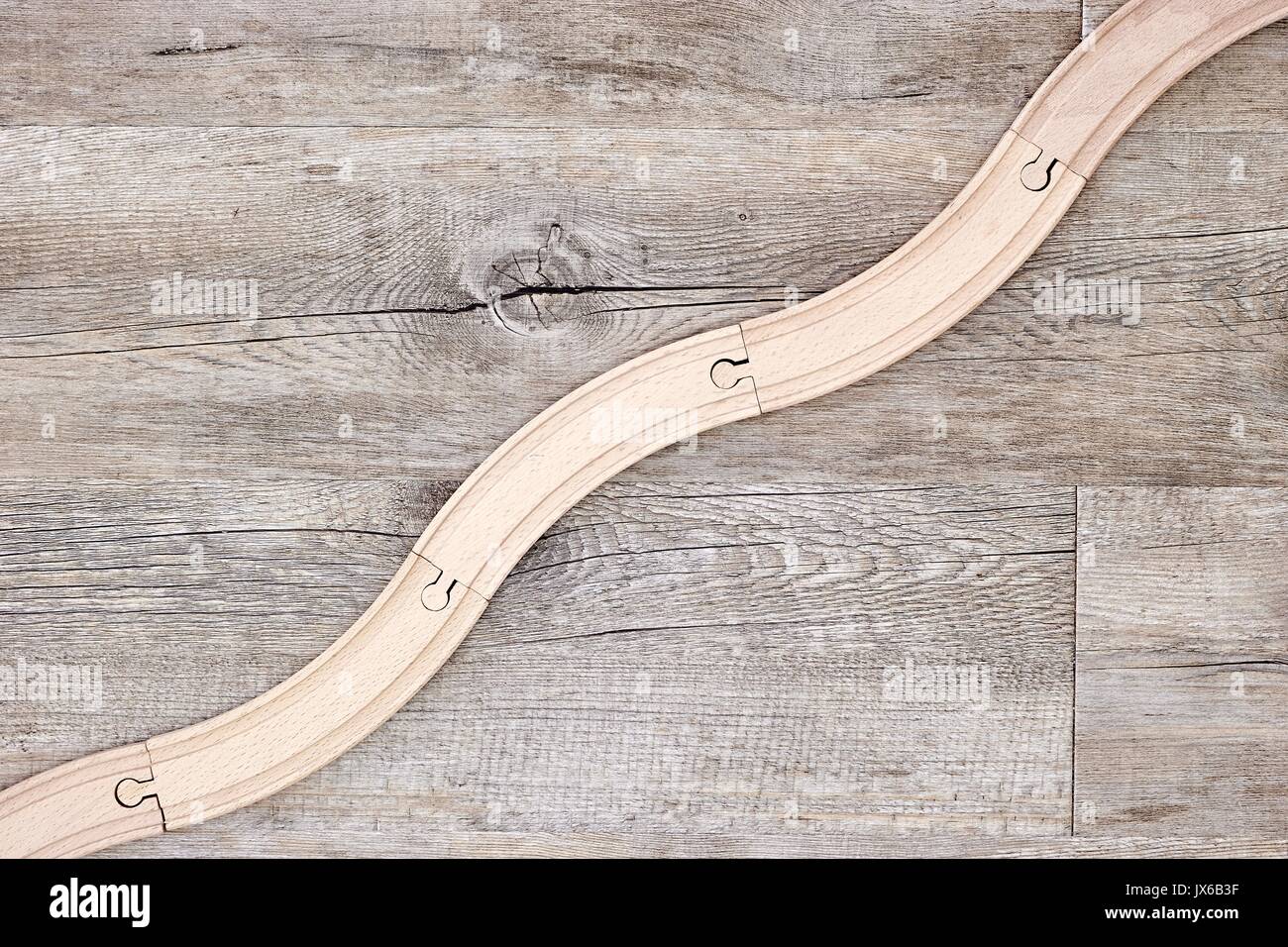 A studio photo of a wooden train track Stock Photo - Alamy