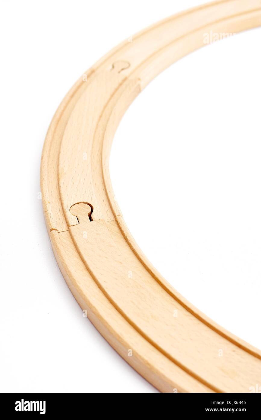 A studio photo of a wooden train track Stock Photo - Alamy